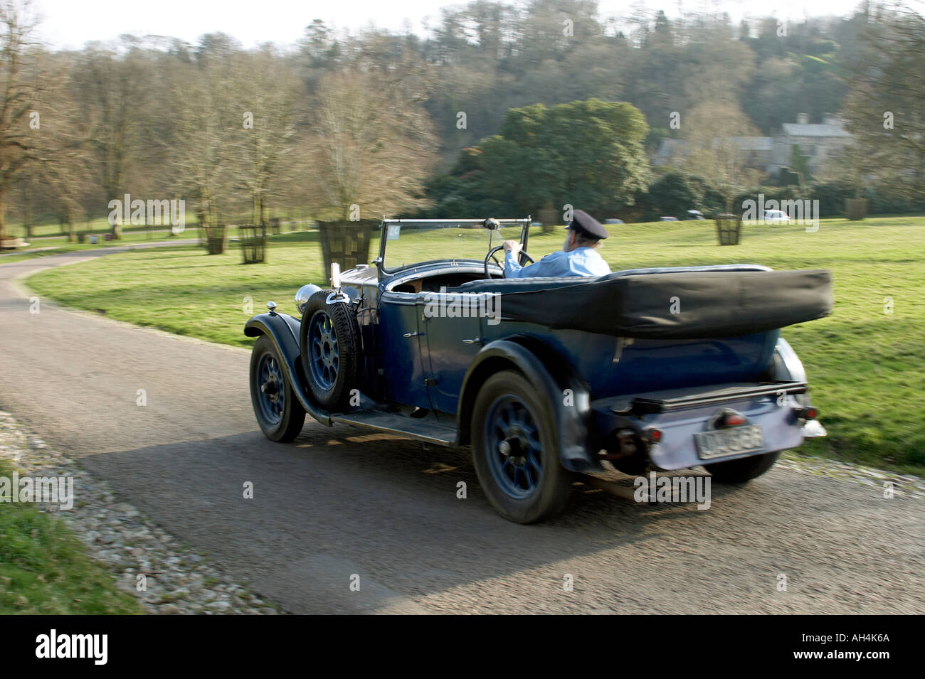 Humber blue open top old vintage sports car from behind at speed with ...