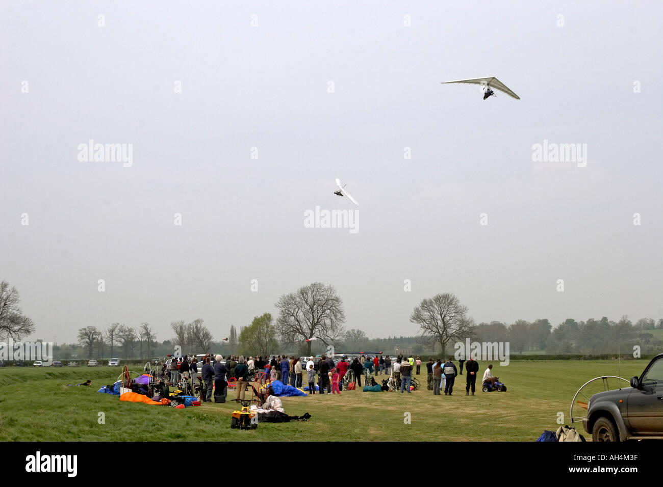 Foot launched flexwing microlight pilots flying with a a jet powerd ...