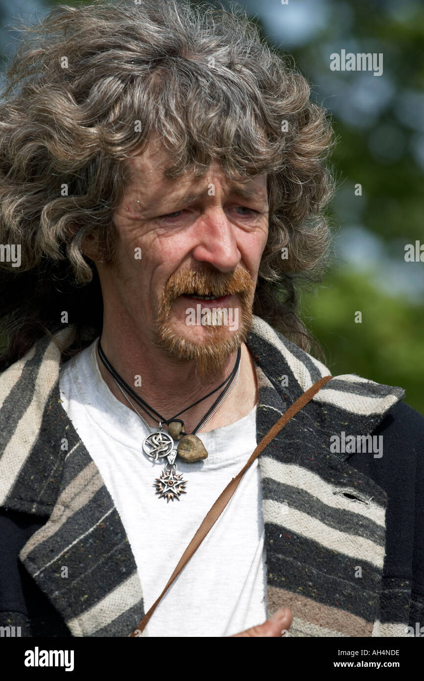 Pagan man at celebration of a handfasting betrothal ceremony at Avebury ...