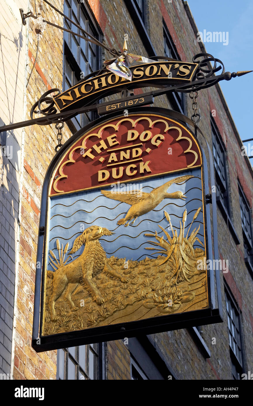 The dog and Duck pub logo sign London W1 England Stock Photo - Alamy