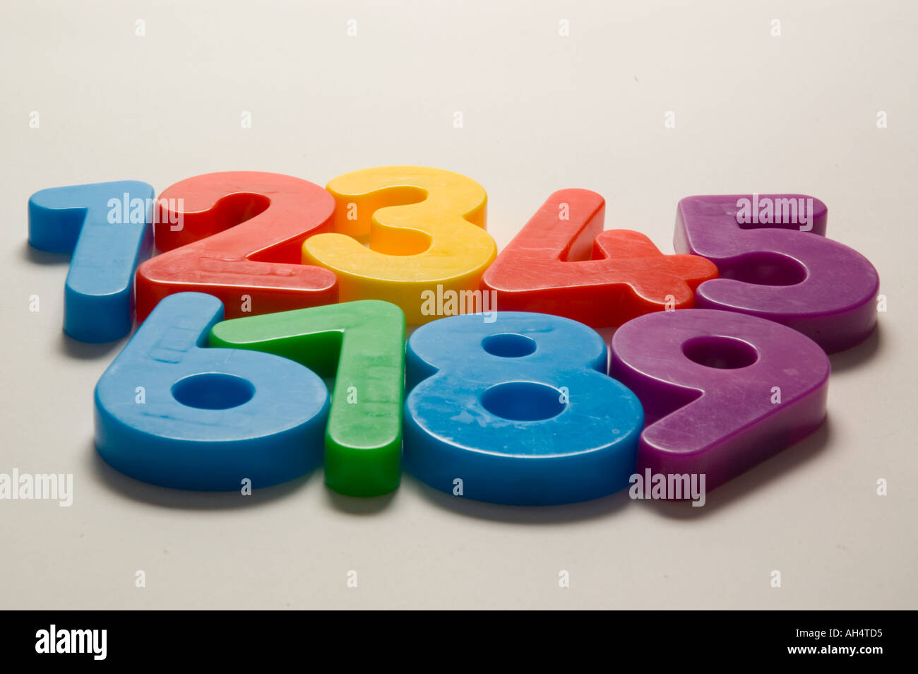Multicoloured plastic numbers Stock Photo - Alamy