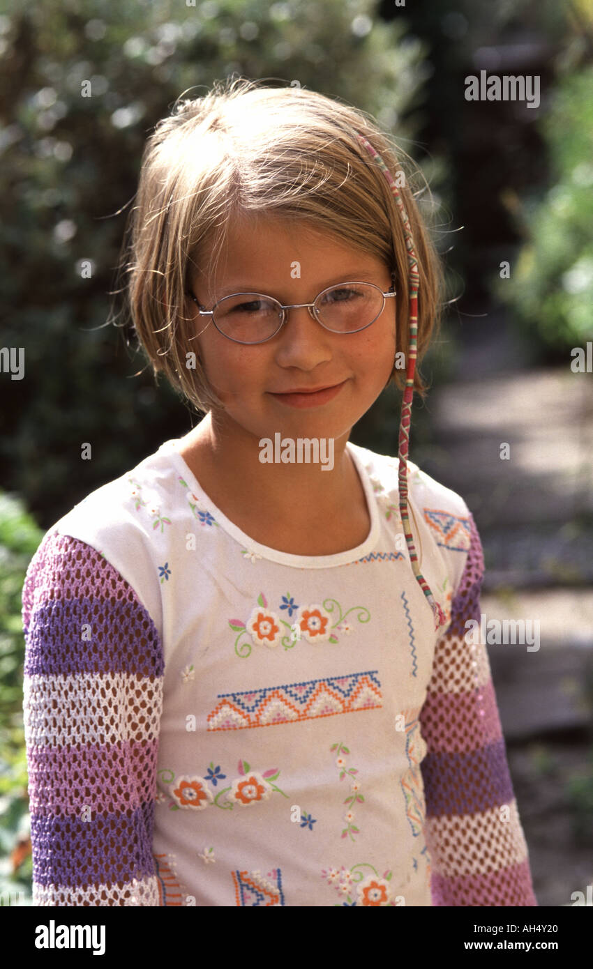 Portrait of a little girl wearing a hair braid Stock Photo - Alamy