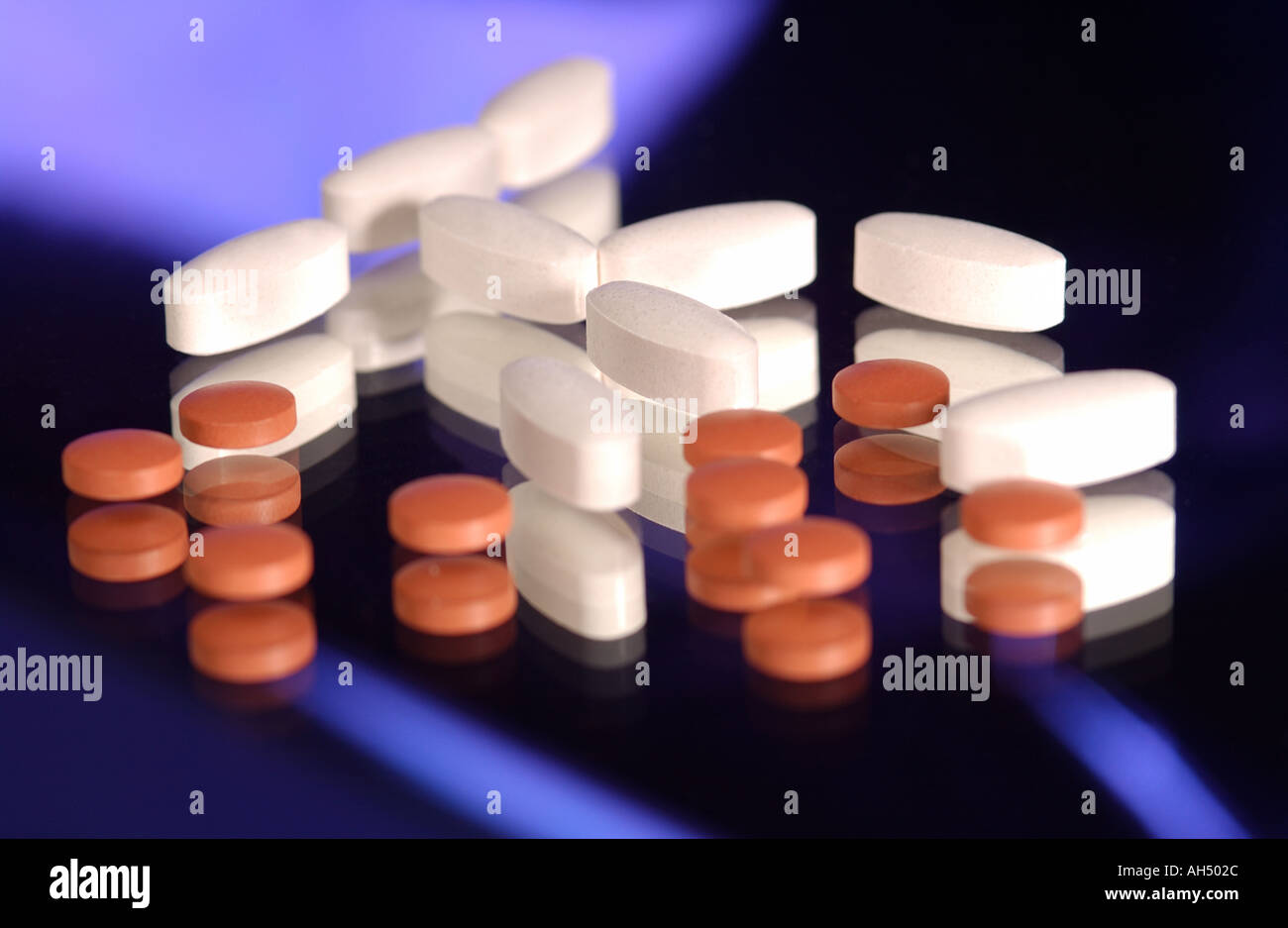 Close up of Red and white multivitamin tablets tablet multivitamins ...