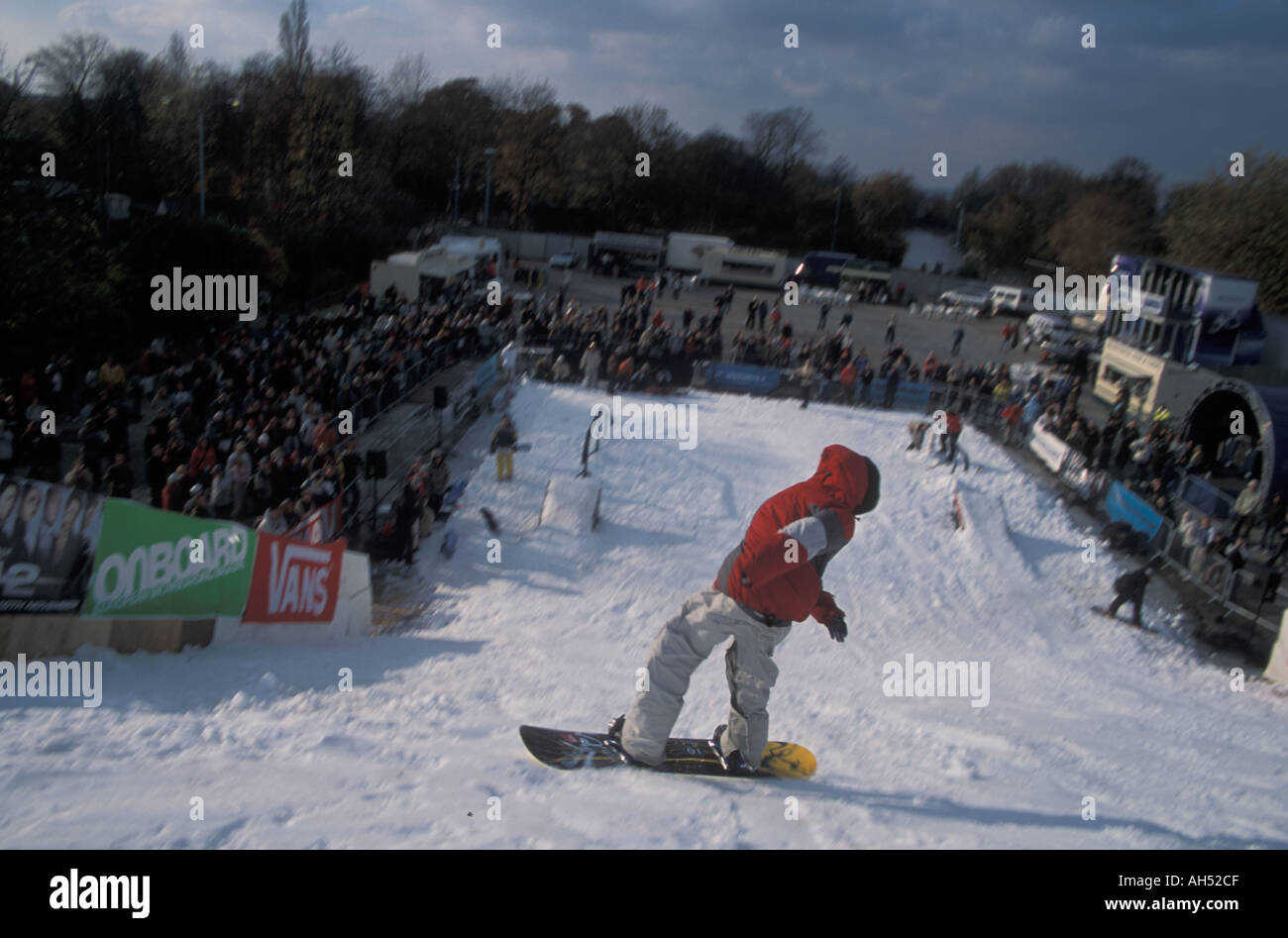 A Snowboarder sliding on snow during an event at Alexander palace ...