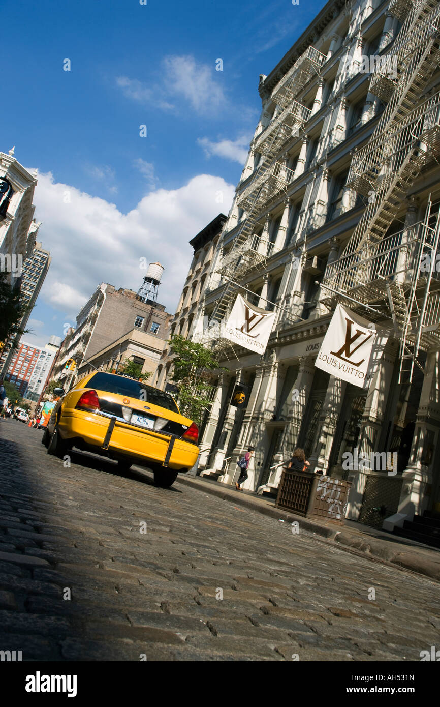 YELLOW TAXI CAB (©FORD MOTOR COMPANY 2001) GREENE STREET SOHO MANHATTAN ...