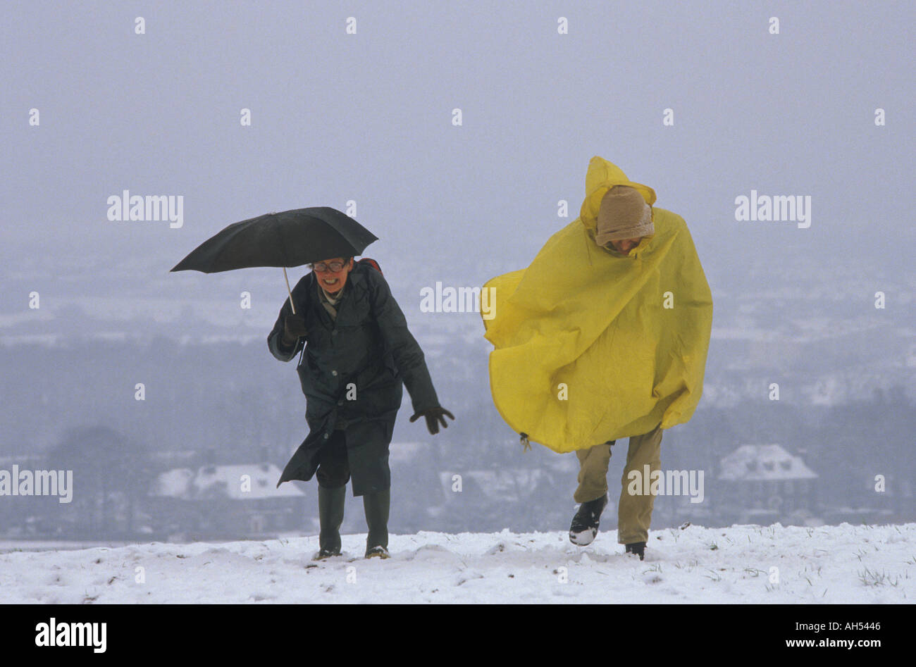 Walking against wind hi-res stock photography and images - Alamy