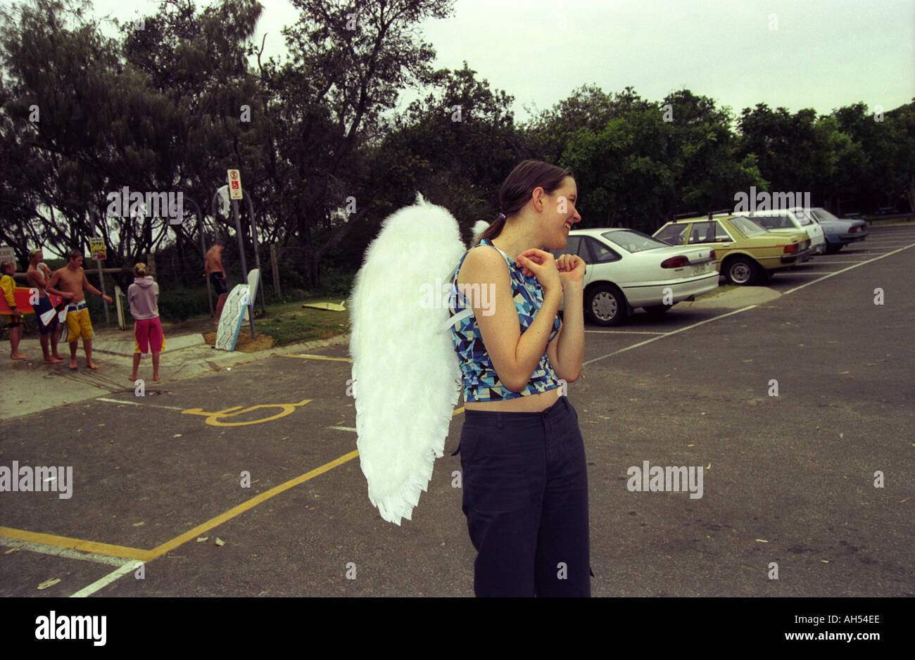 angel series laughing shy embarrassed angel 2127 Stock Photo - Alamy