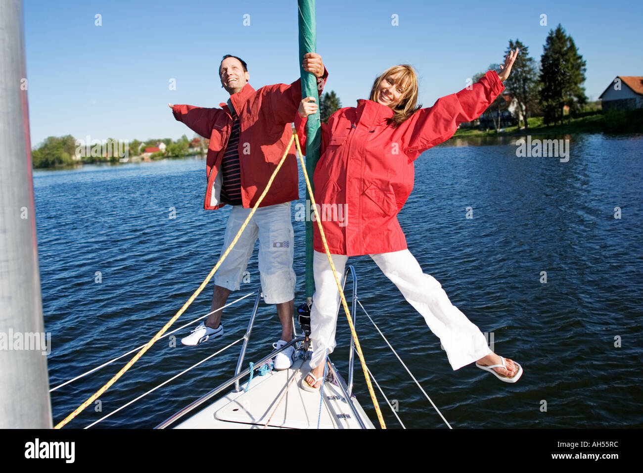 outdoor day summer tree trees water lake boat yacht sailboat deck mast ...
