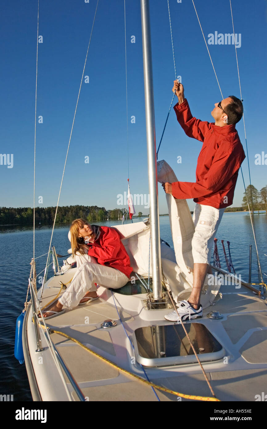 outdoor day summer water lake tree trees boat yacht sailboat deck mast ...