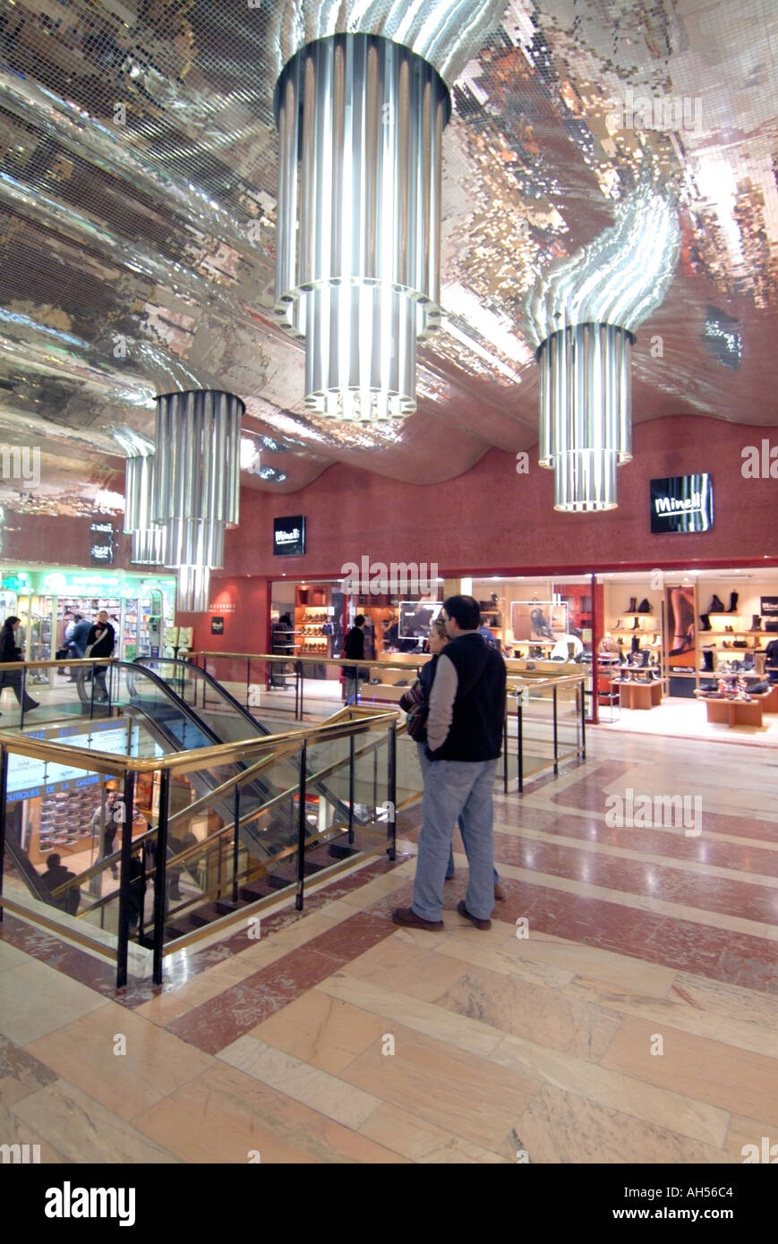 Paris modern shopping arcade directly off the Champs Elysees small shop ...