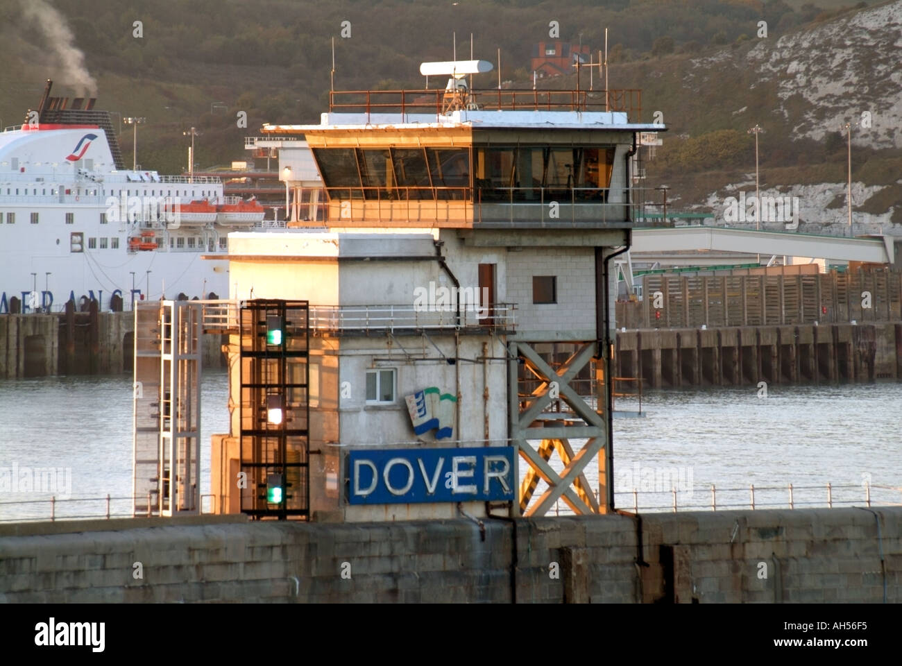 Dover Harbour wall and entrance control tower with ferry beyond Stock ...
