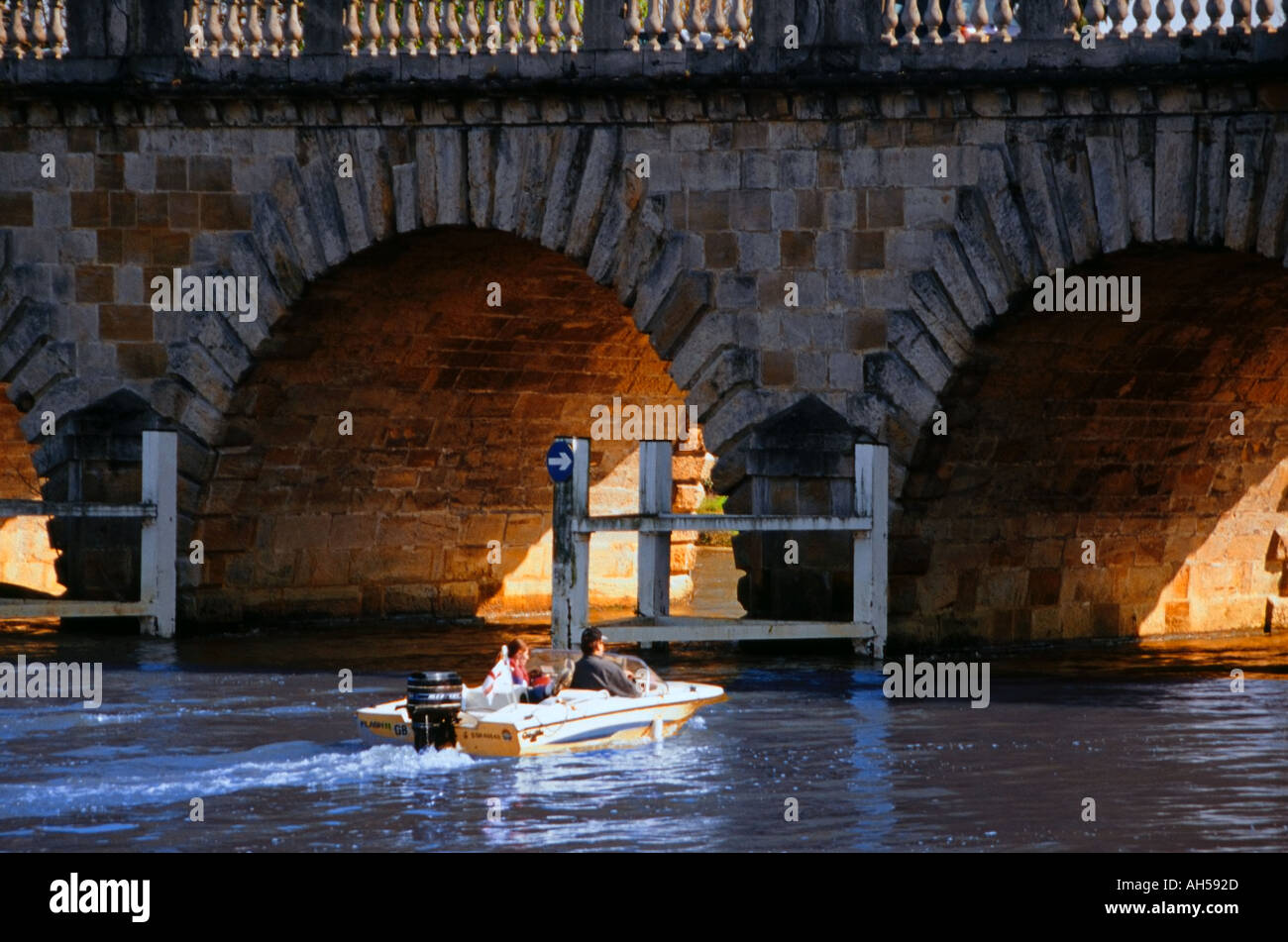 boat going underneath bridge river thames maidenhead berkshire england ...