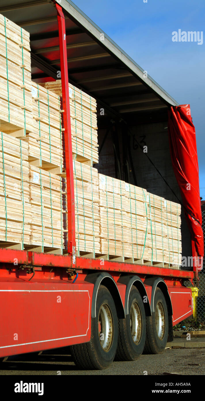 Trailer loaded with timber Stock Photo - Alamy