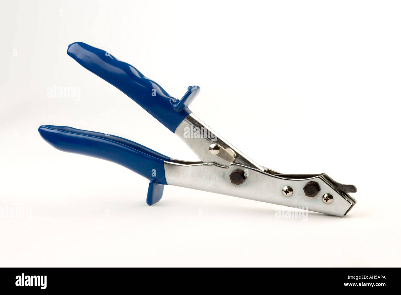 A nibbler tool for cutting up sheets of metal Stock Photo - Alamy