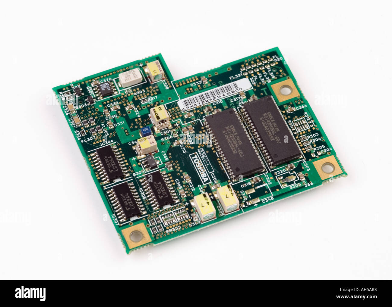 A laptop computer memory circuit board showing various electronic ...