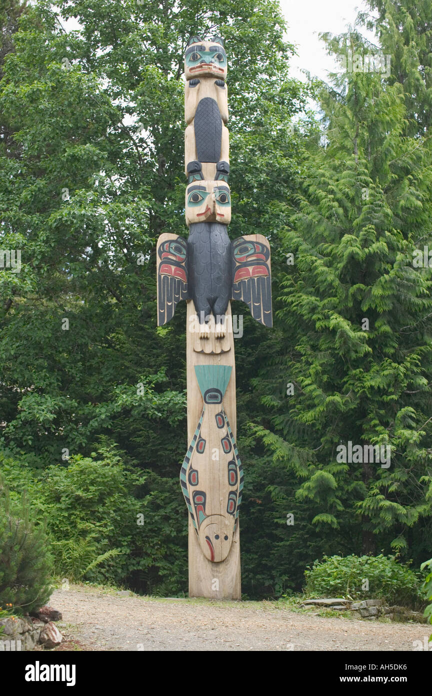 A Tlingit Native American totem pole at Saxman village near Ketchikan ...