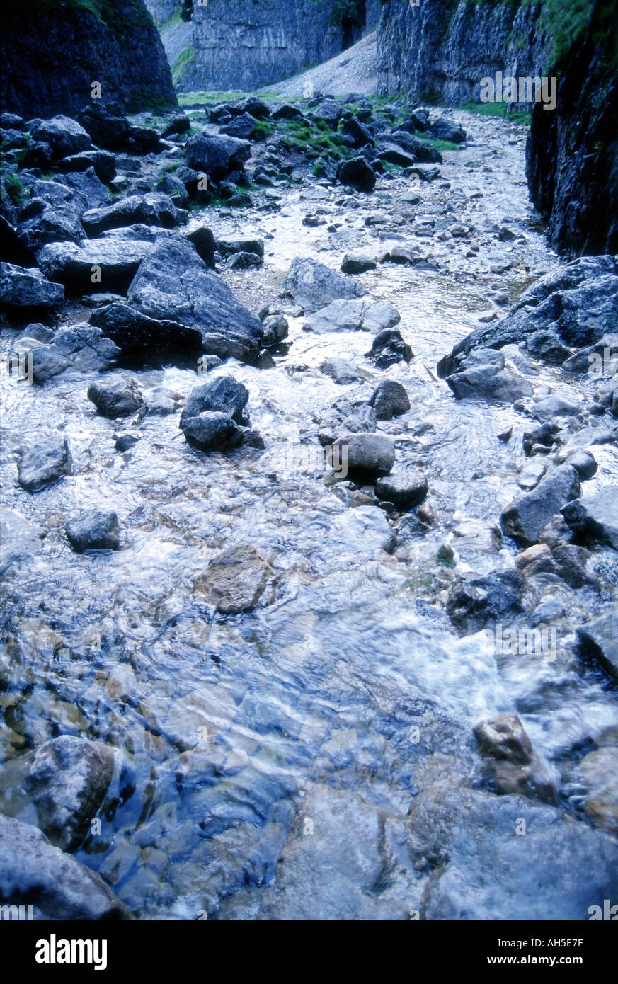 River water flowing through steep rocky valley in Yorkshire Stock Photo ...