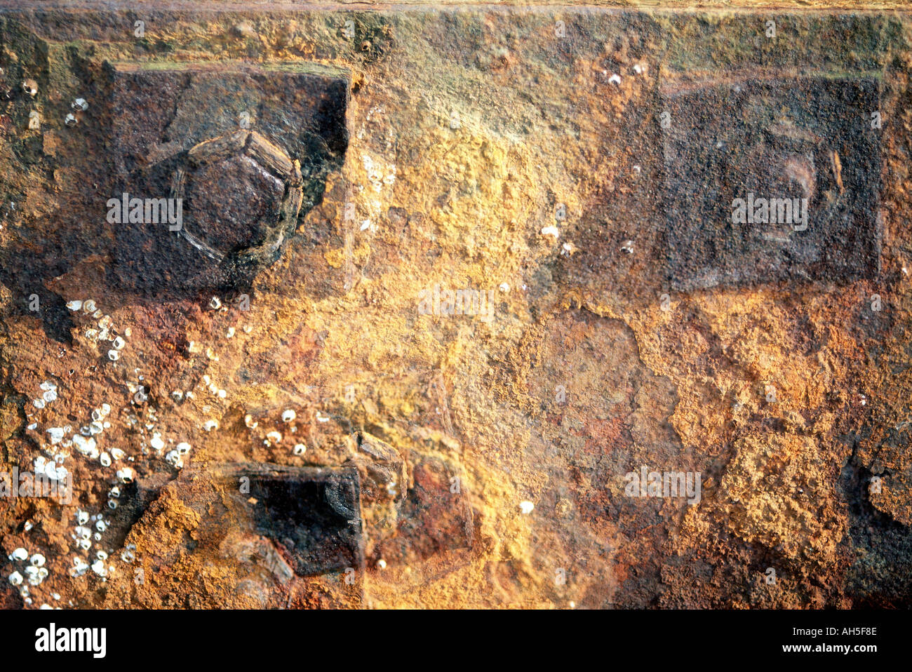 Rusty bolts in metal Stock Photo - Alamy
