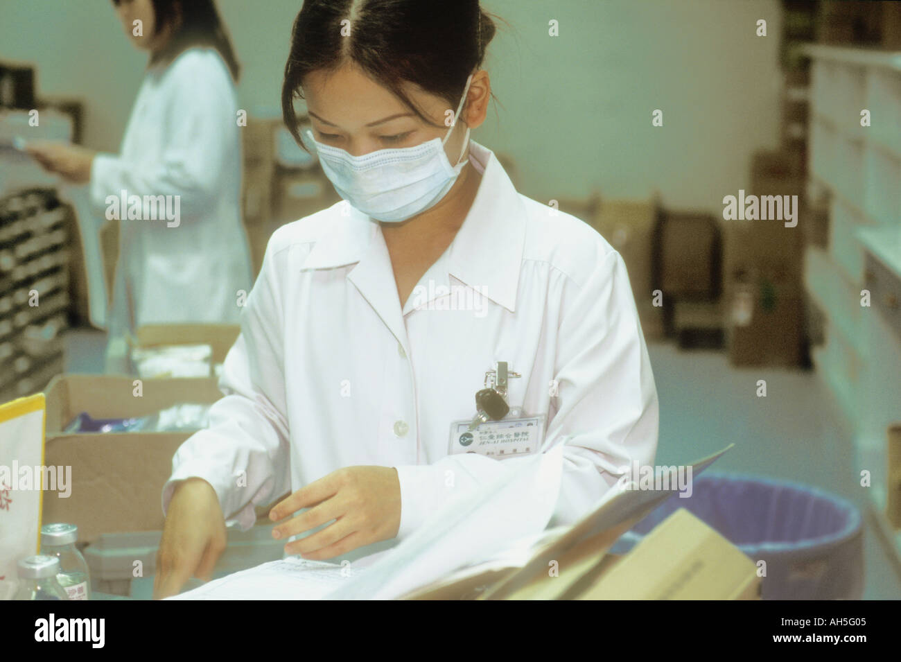 Nurse filling prescriptions in hospital pharmacy Taiwan China Stock ...