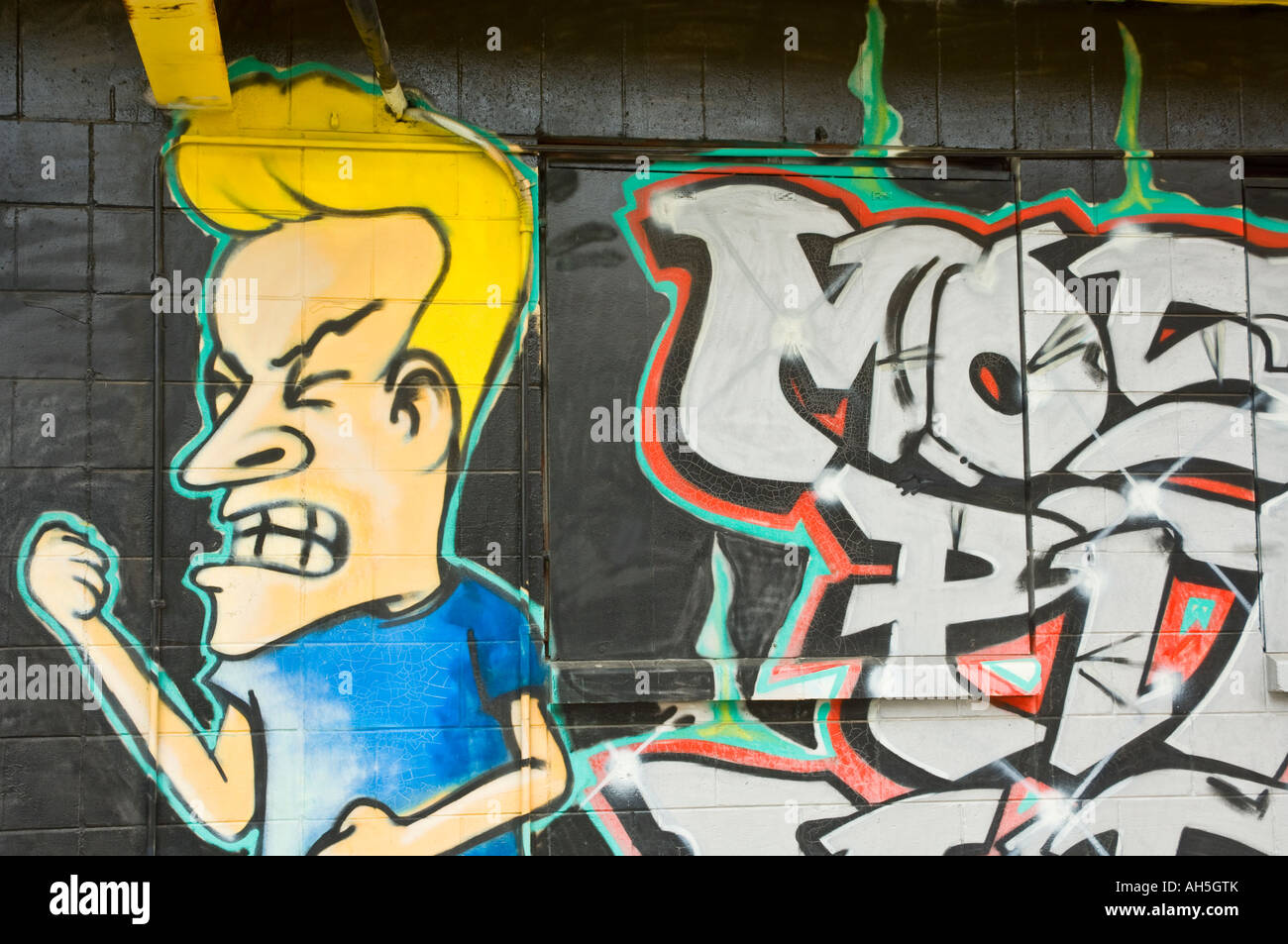 cartoon on exterior wall of mosh pit Stock Photo - Alamy