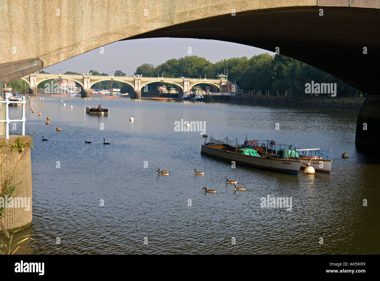 Richmond lock and footbridges seen through Twickenham bridge Stock ...