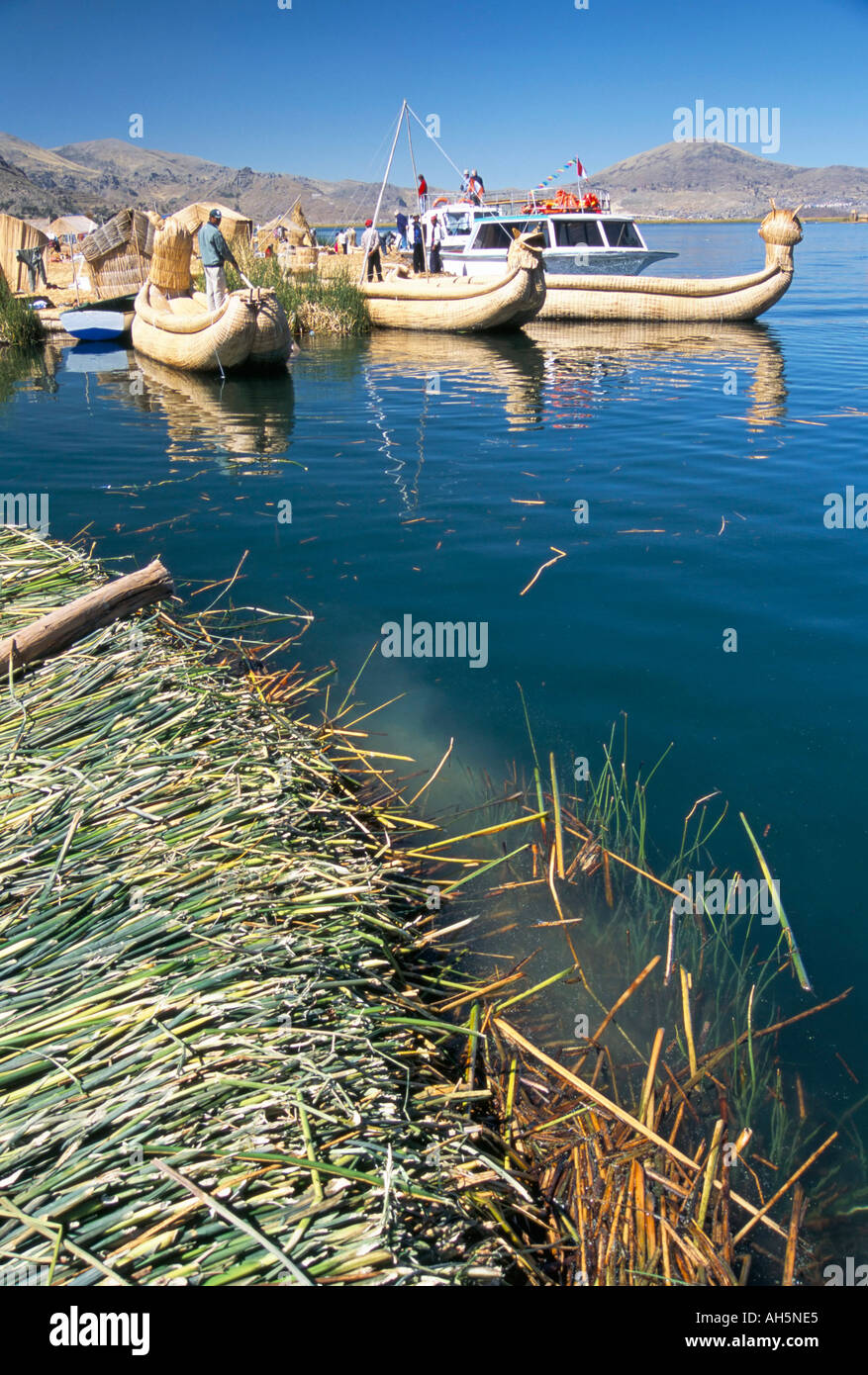 Traditional Uros Urus reed boats at floating island Islas Flotantas ...