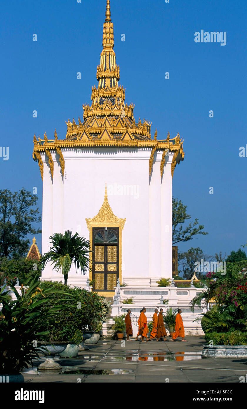 Monks walking in front the the Mondap Library Royal Palace Phnom Penh ...