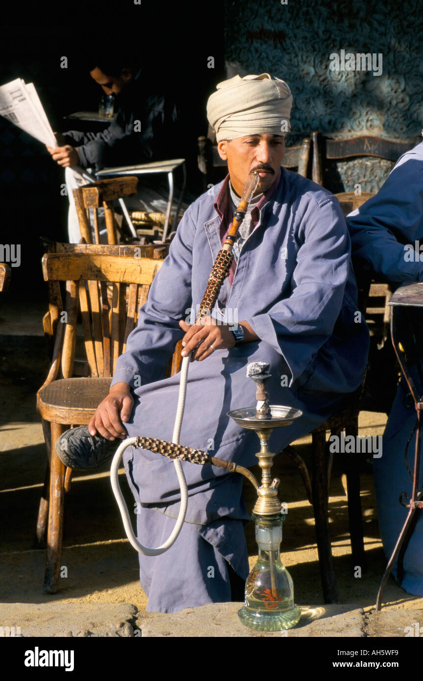 Young Saudi Arabian Man Smoking Arabic Hubble Bubble Hookah, 60% OFF