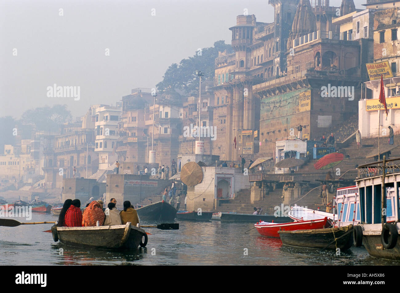 Boat on the River Ganges at dawn Varanasi Benares Uttar Pradesh India ...