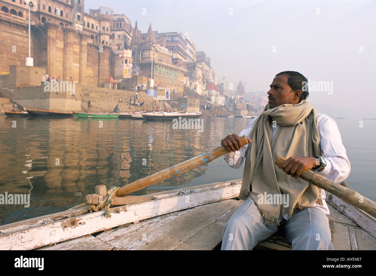 Indian man boatman rowing boat hi-res stock photography and images - Alamy