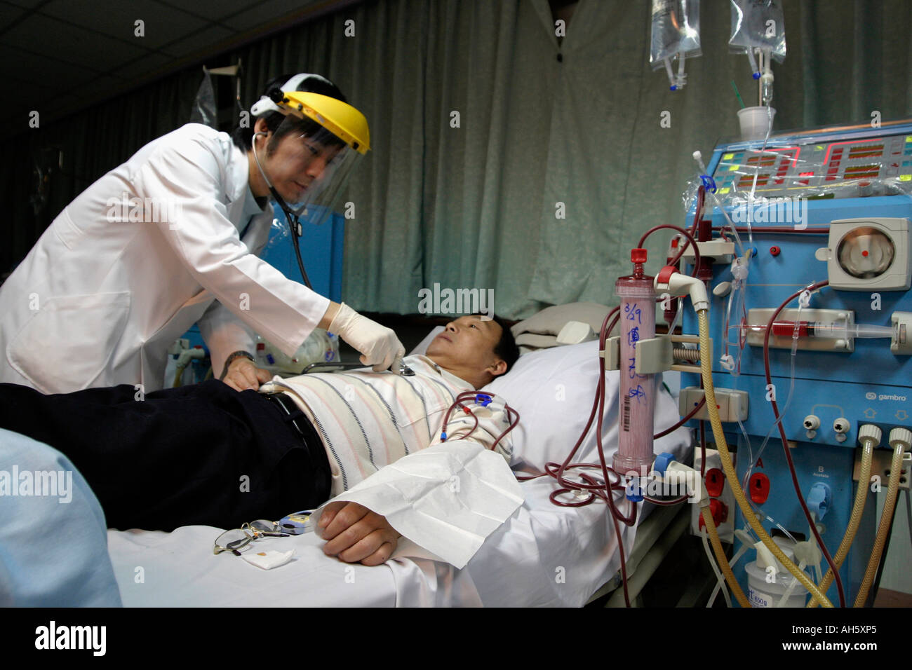 Doctor examines the patient with dialysis shunt Stock Photo - Alamy