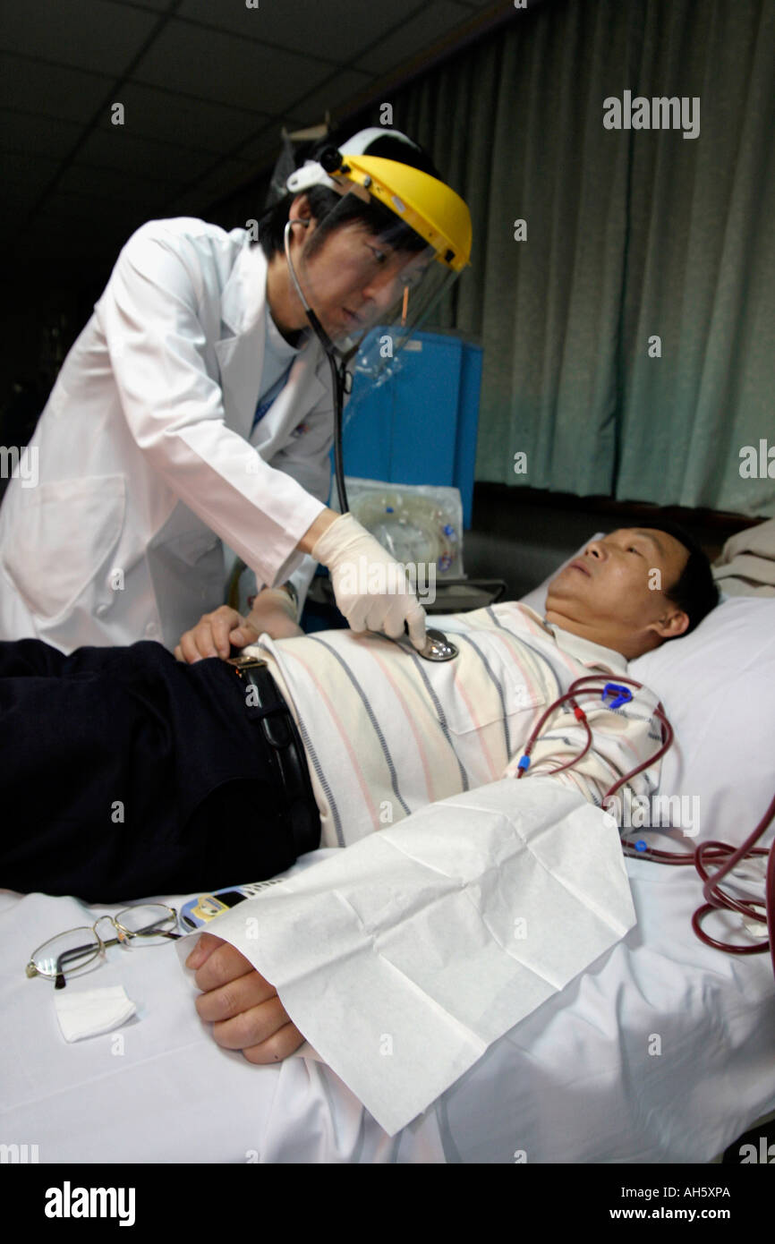 Doctor examines the patient with dialysis shunt Stock Photo - Alamy