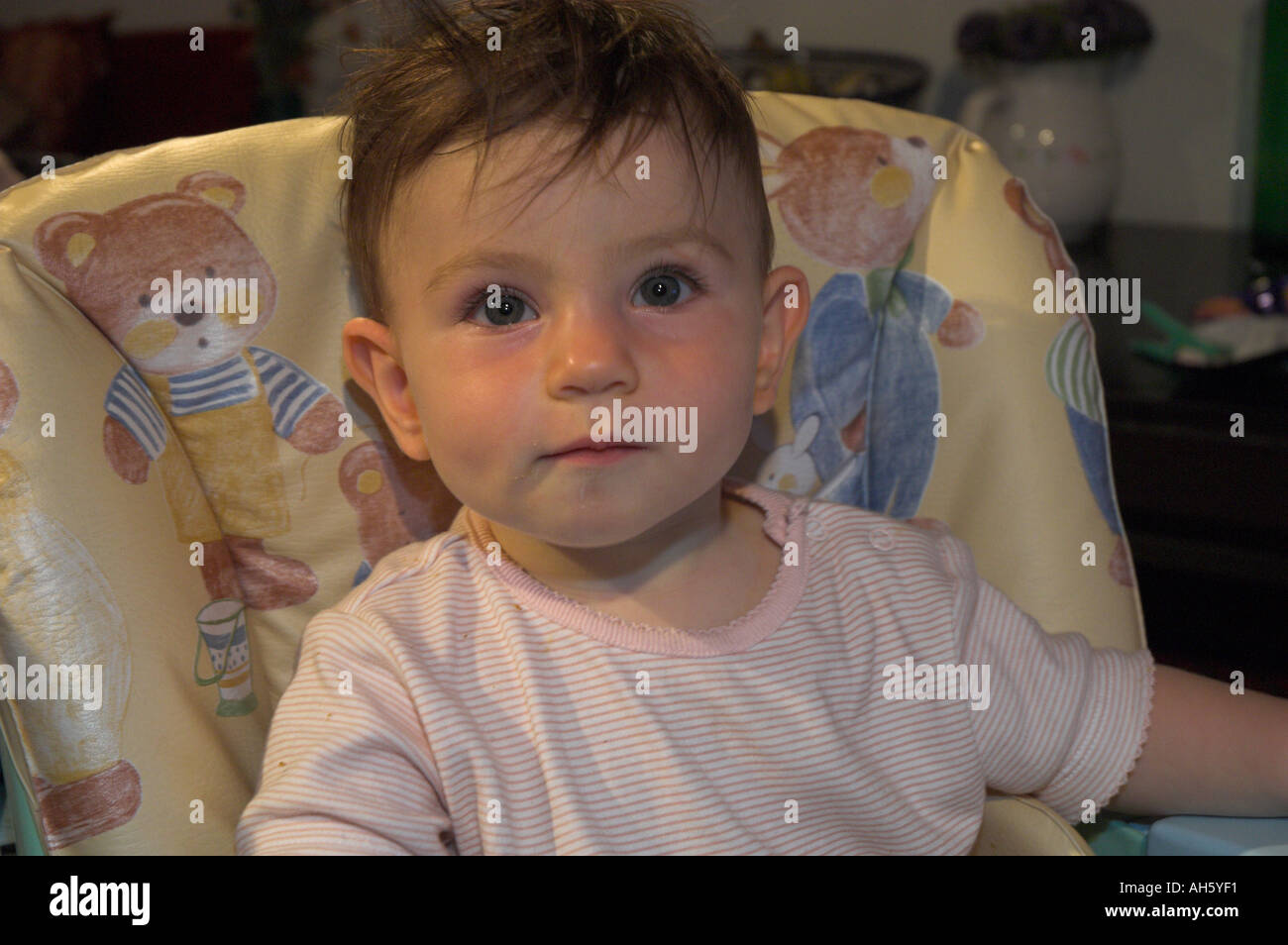 portrait of a baby girl looking intensely upwards Stock Photo - Alamy