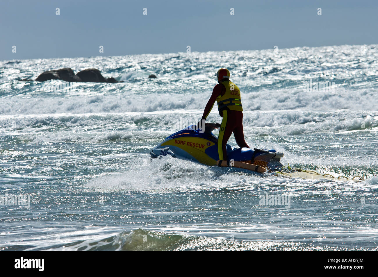 Jet ski rider in surf Stock Photo - Alamy