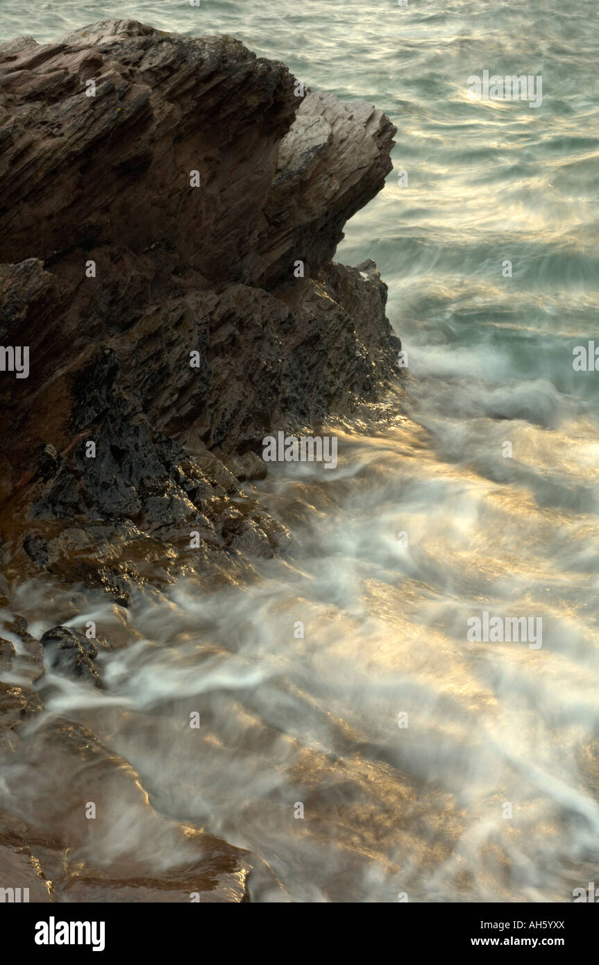 Wave cut rock channel at sunset Wembury Devon UK Stock Photo - Alamy