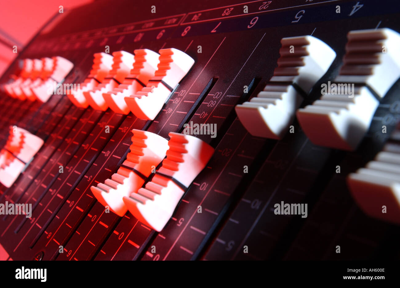 Sliders and fade controls on sound mixing desk Stock Photo - Alamy