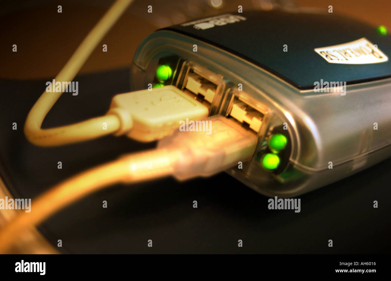 Computer modem with cables and green lights showing activity Stock ...