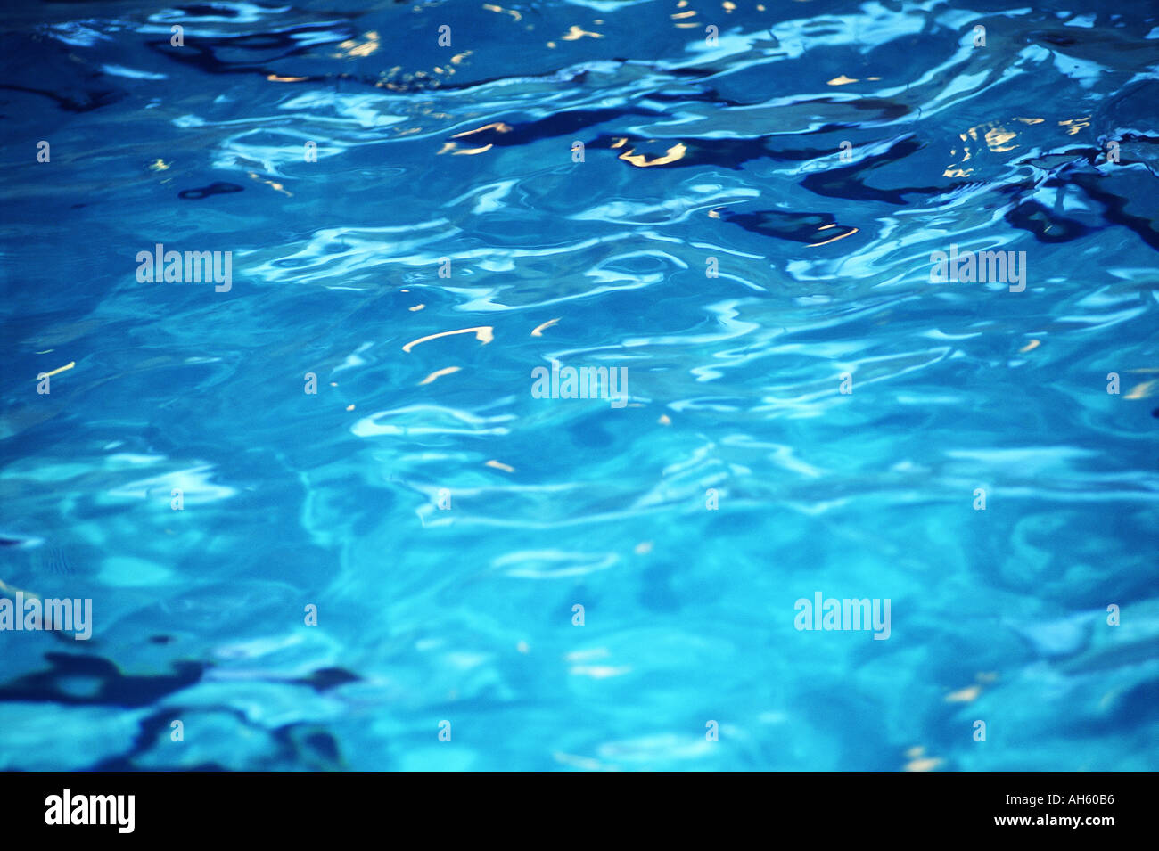 Blue shimmering reflections in swimming pool Stock Photo - Alamy