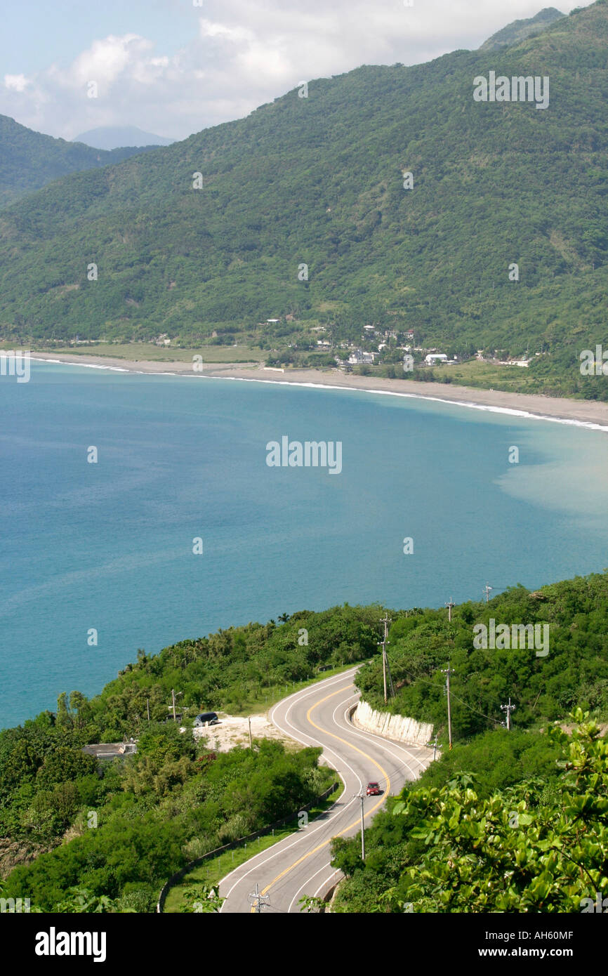 Road beside beach and mountain Stock Photo - Alamy