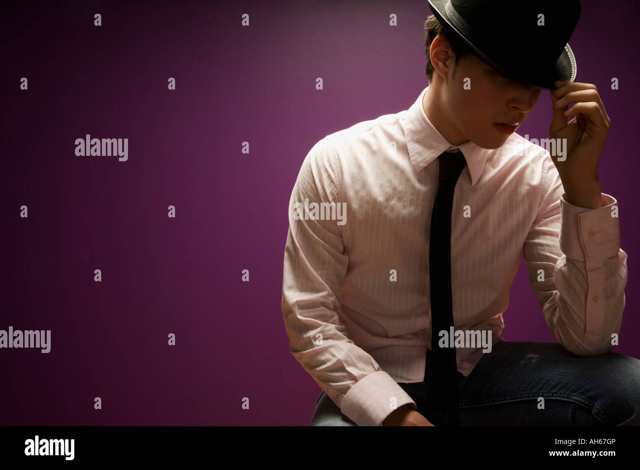 Man tipping hat Stock Photo - Alamy