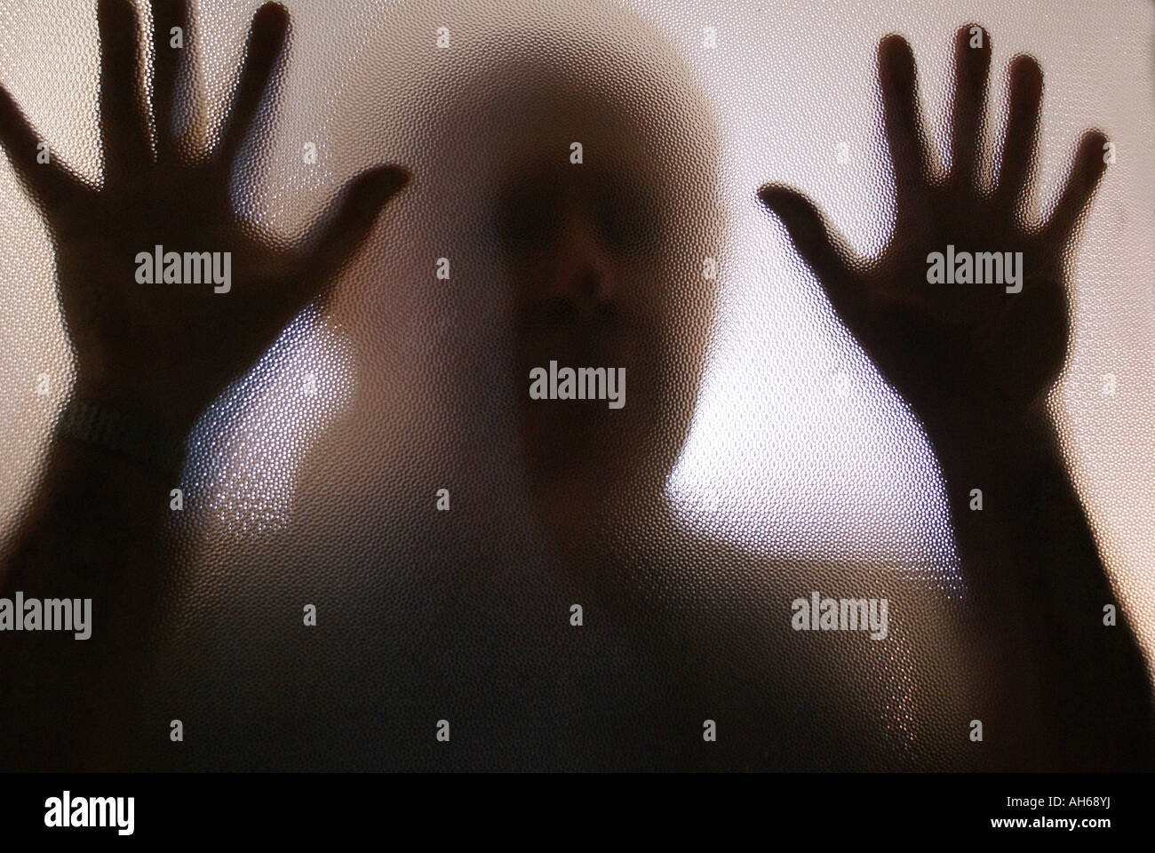 Silhouette of Man Through Window Stock Photo - Alamy