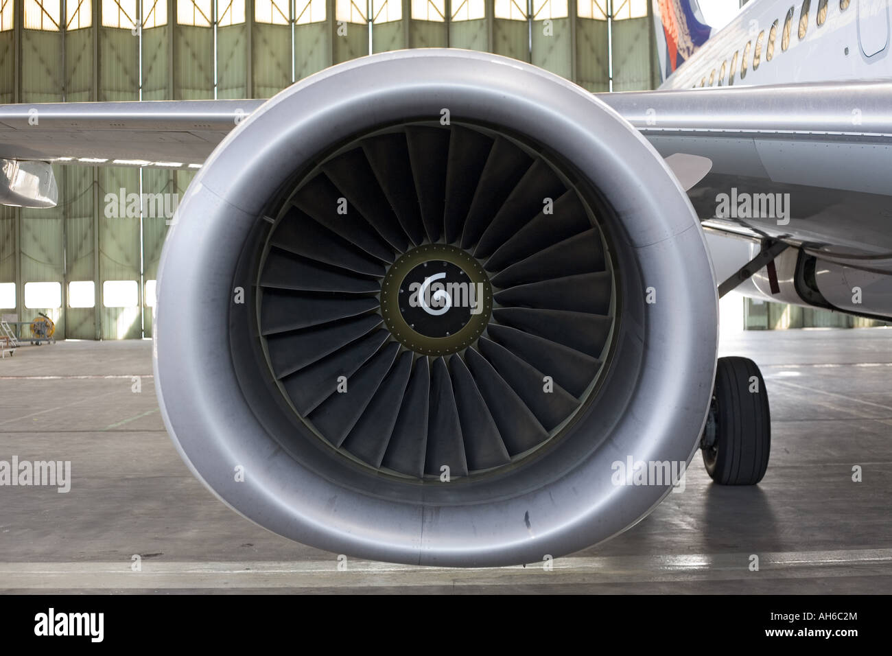 Jet engine at aircraft in the hangar back view Stock Photo - Alamy
