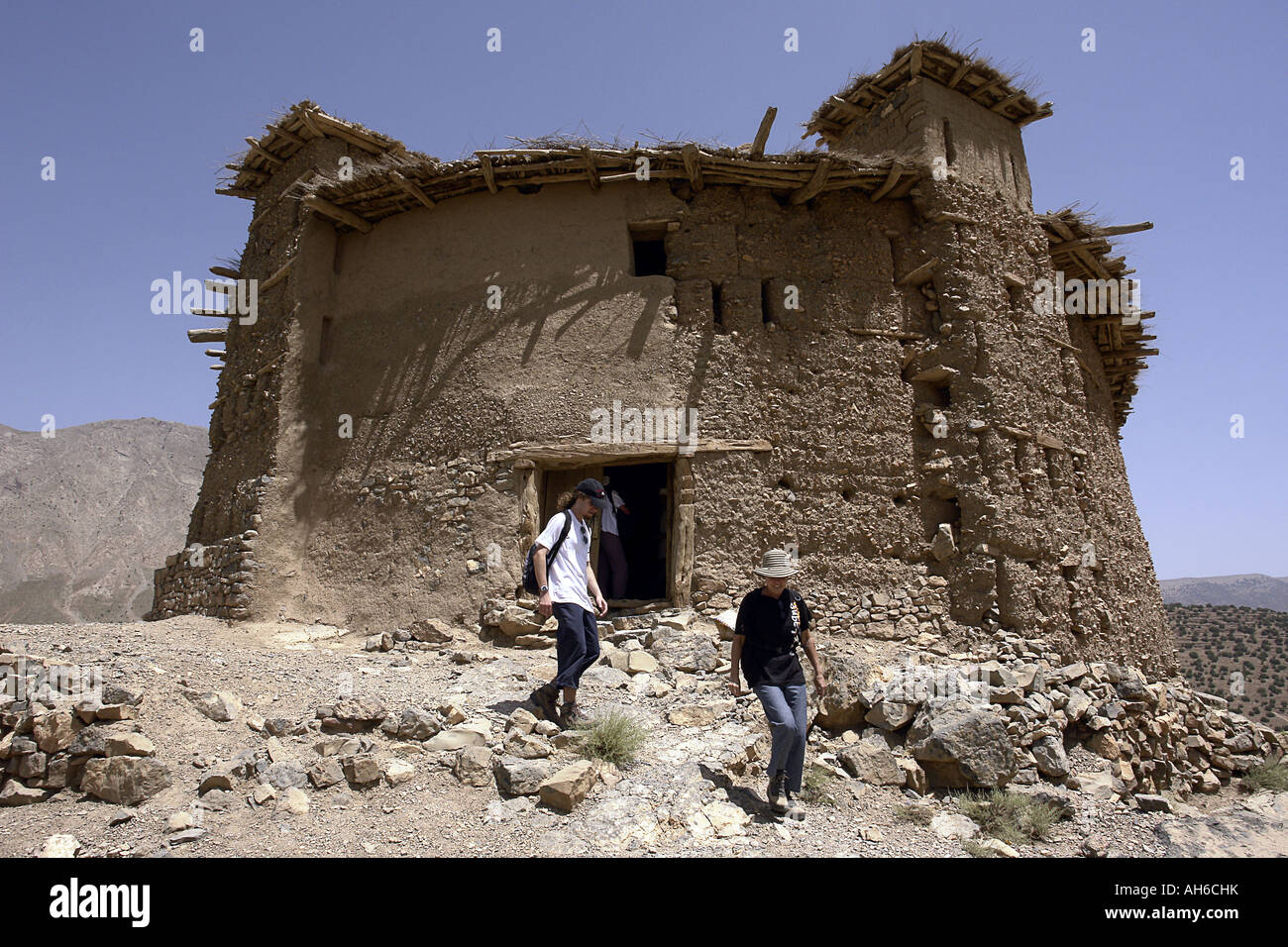 Hikers in front of Sidi Moussa granary and saint s shrine Aït Bouguemez ...