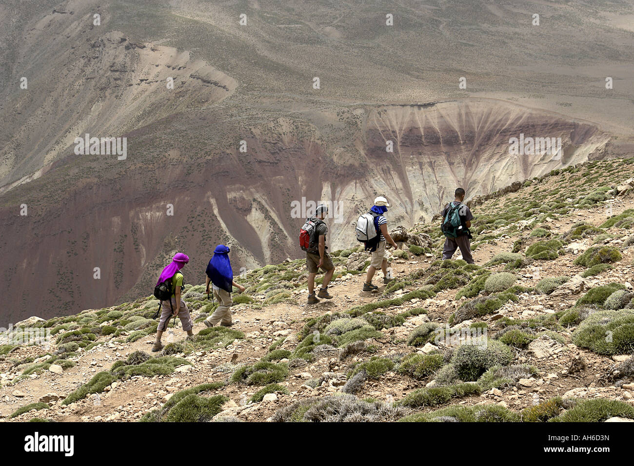 Hikers on the way to Tarkedit plateau High Atlas Region Morocco Stock ...