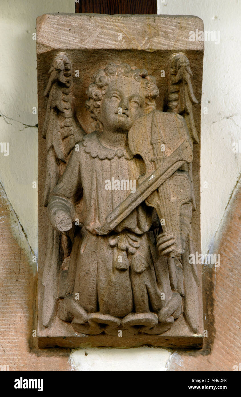 Angel with violin, sculpture. Church of Saint Peter, Great Asby ...
