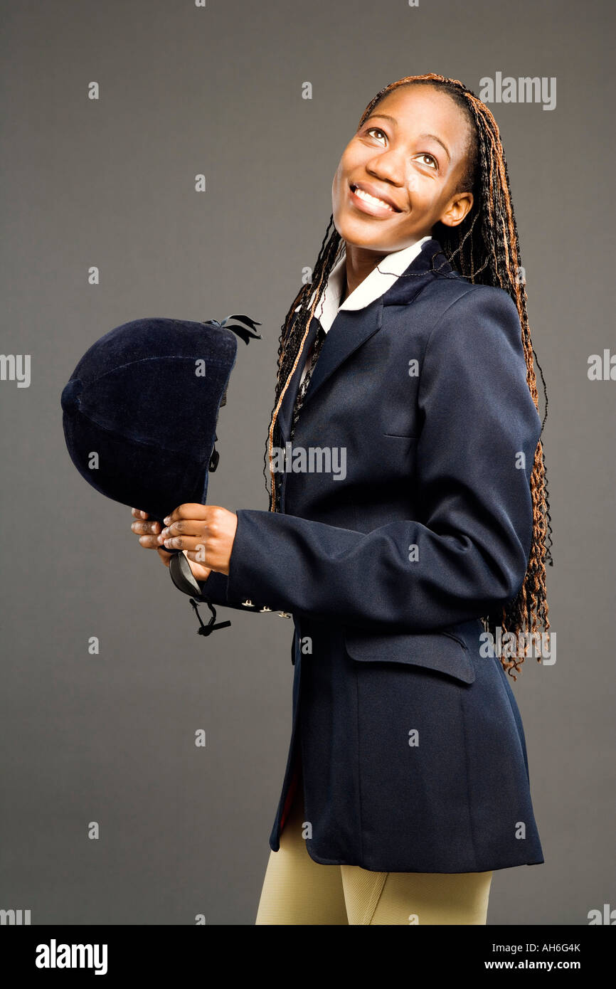 Woman in horse riding outfit Stock Photo - Alamy