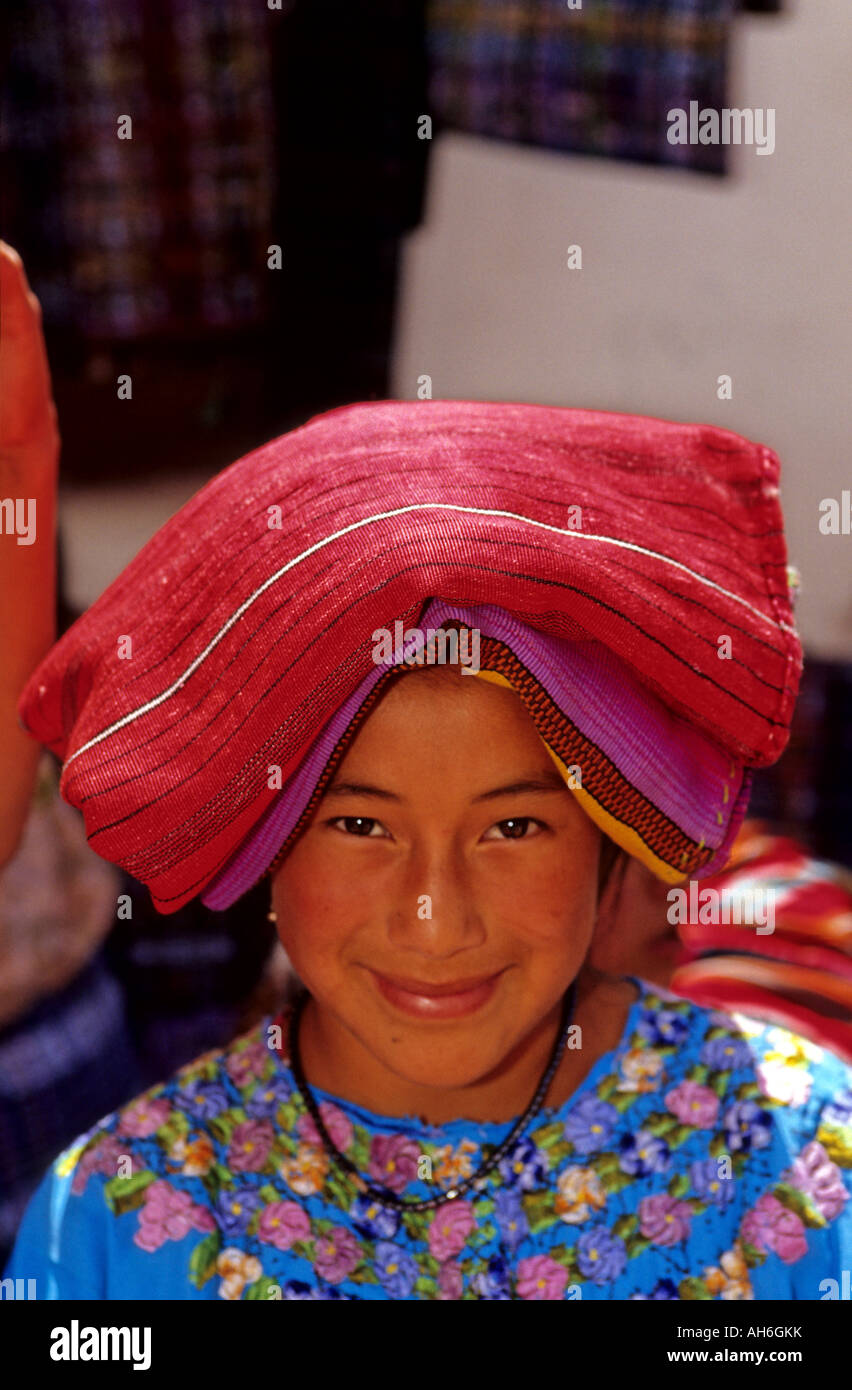 Woman with clothing draped over head at market in the village of ...