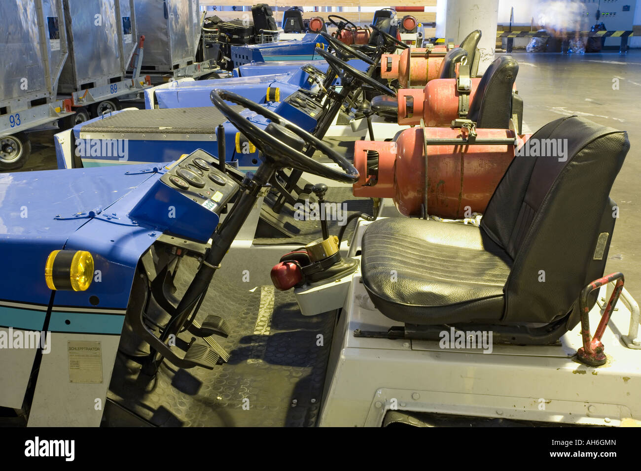 parking gas powered cargo cars in the airport Stock Photo - Alamy