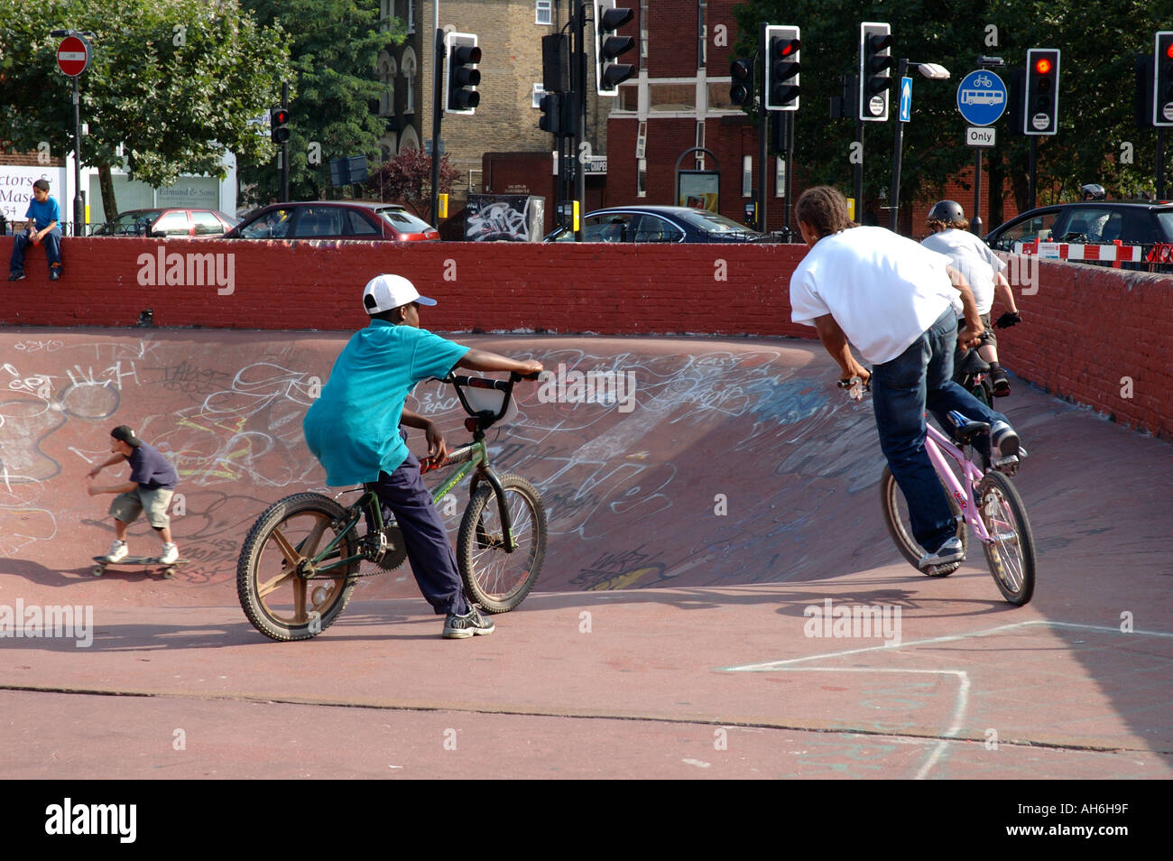 Youths on BMX cycles at urban Skate park in Brixton South London Stock ...