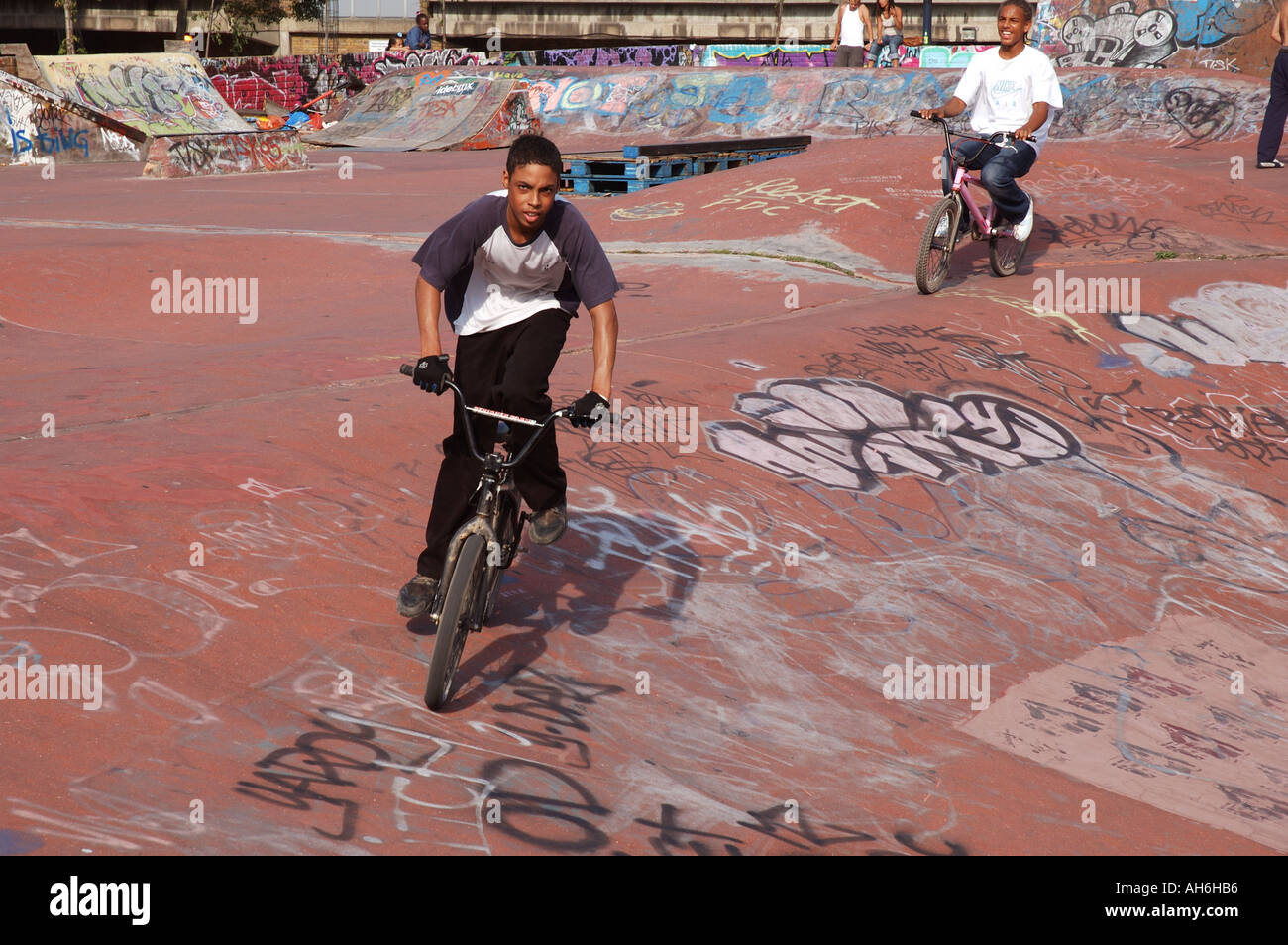 Youths on BMX cycles at urban Skate park in Brixton South London Stock ...